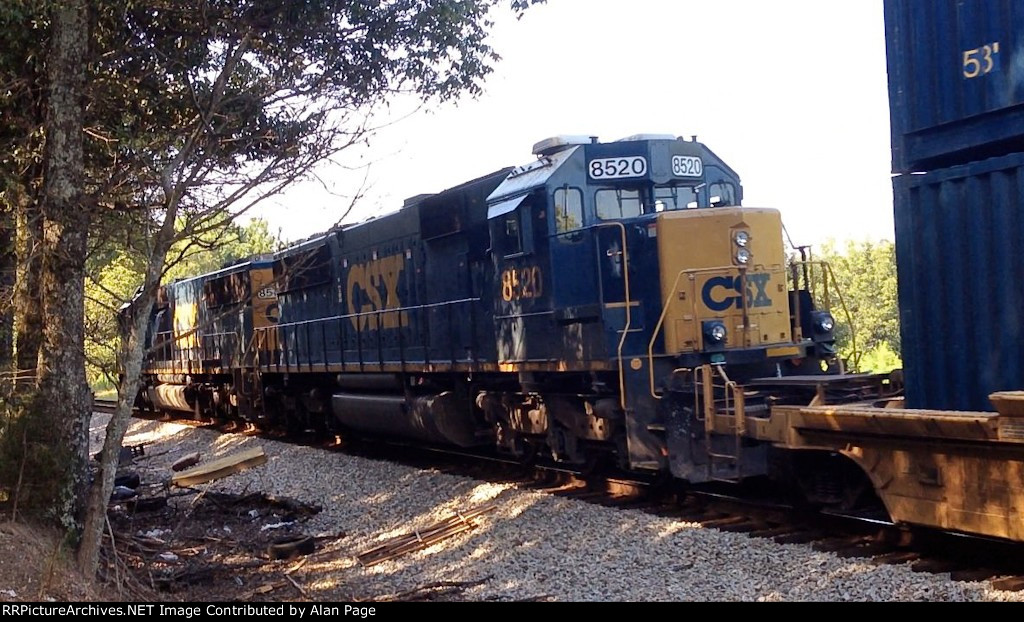 CSX SD50-2's 8576 and 8520 round the curve